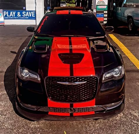 Dark Knight Chrysler 300 On Color Matched Lexani Rims Artofit