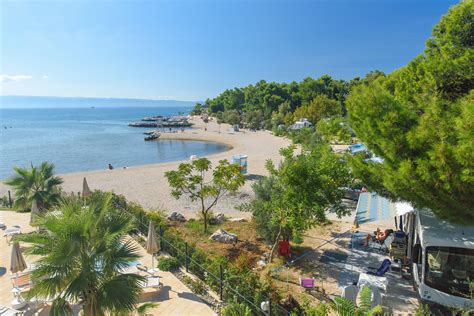 Enjoy Swimming And Sunbathing On 2 Pebble Beaches In The Campsite