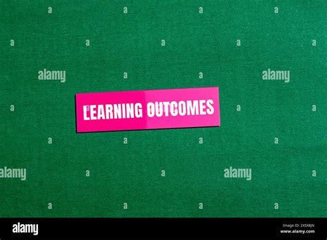 Learning Outcomes Words Written On Pink Paper Sticker With Green Background Conceptual Learning