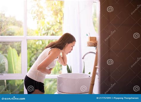 Sick Asian Woman Vomiting Into Basin In Toilet Nausea Indigestible