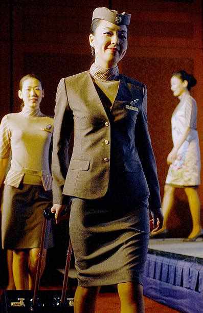 Asiana Flight Attendant Photos And Premium High Res Pictures Getty Images
