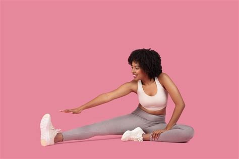 Premium Photo Woman Doing Leg Stretch Exercise