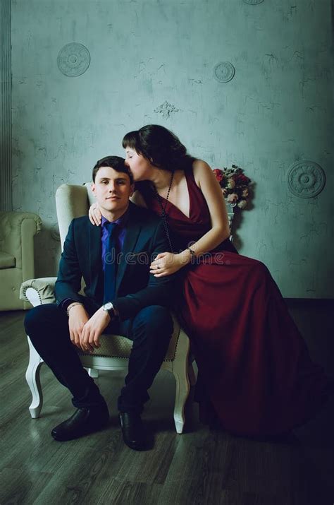 Attractive Guy With A Girl Kissing In The Room Stock Image Image Of