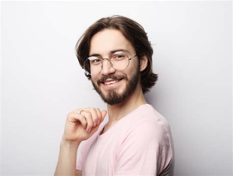 Premium Photo Cheerful Man Wearing Glasses Glad To Find Suitable Well Paid Job