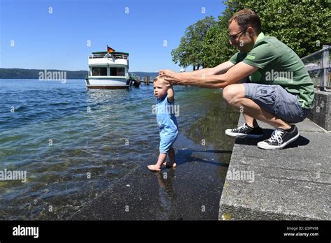 Lake Constance Germany 23rd June 2016 Robert Olschewski With His Son Maximilian On The Banks