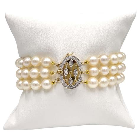 Three Row Multi Strand Pearl Bracelet With 14k And 18k Diamond Clasp
