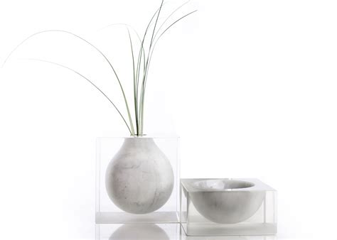 Moreno Ratti Suspends Marble Volumes Inside Resin Cubes