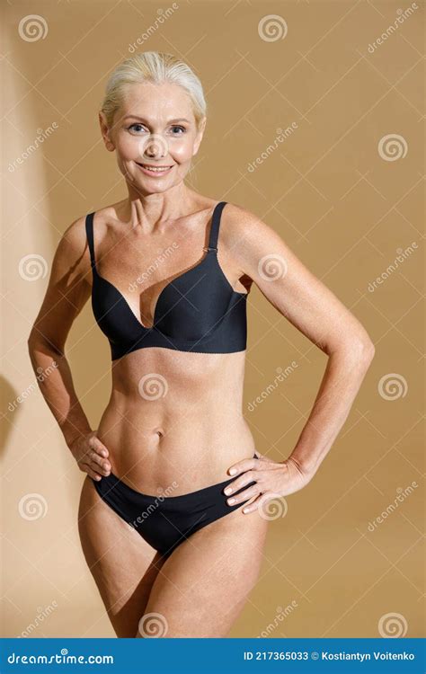 Beautiful Mature Blonde Woman With Perfect Fit Body In Black Underwear