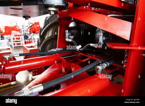 Close Up Image Of Parts Of New Tractor At Agricultural Machinery Plant