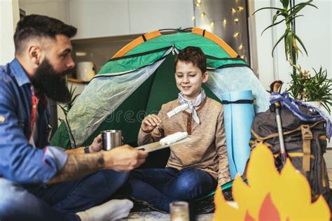 Dad With His Son Camp Inside Their Home Stock Image Image Of Night