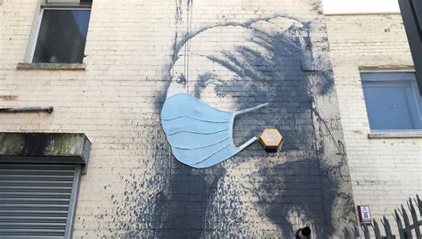Did Banksy Just Add A Face Mask To One Of His Murals Creative Bloq
