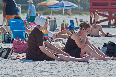 Amish Woman On Beach Amish Country Ohio Amish Amish Culture