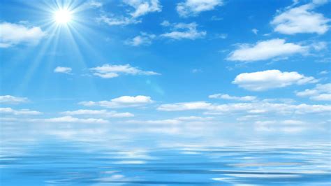Download A Glistening Sun Shines Down Over A Blue Sky