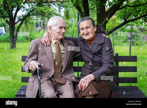Cute 80 Plus Year Old Married Couple Posing For A Portrait In Their