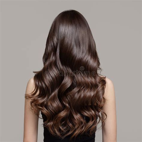 Portrait Of A Beautiful Girl With Luxurious Curly Long Hair Stock