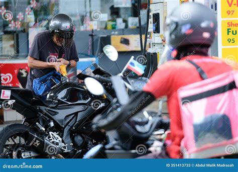 A Shell Gas Station With Logo And Blue Sky Background With Copyspace
