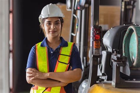 Indian Woman Staff Worker Engineer Supervisor In Safety Suit Work In