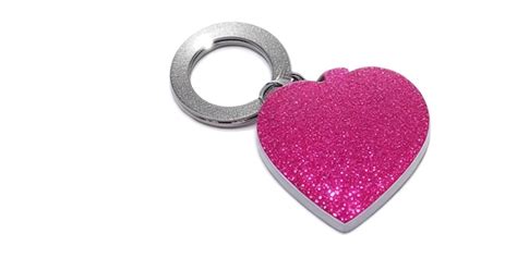 Premium Ai Image A Pink Color Circle Shape Small Keytar On A White Background It Has Two Small