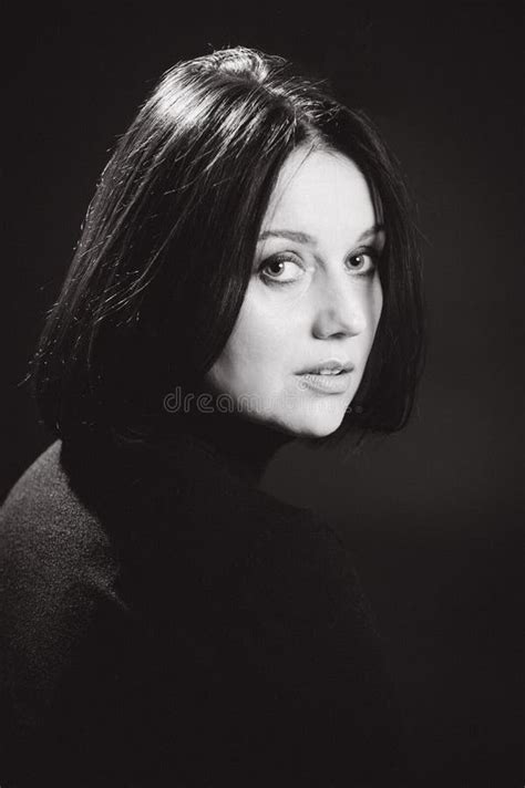 Sensual Portrait Of A Woman With Dark Hair Done In A Low Key Style