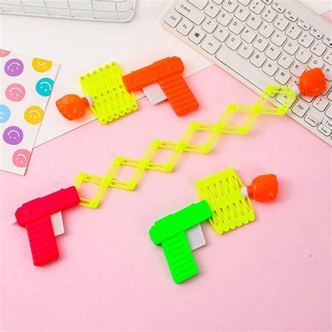 10pcs Of Creative Prank And Funny Spring Fist Toys That Can Be Extended By 15 74in Magic
