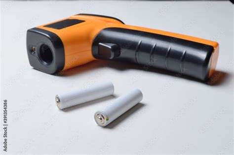 Non Contact Handheld Pyrometer Thermometer Yellow And Batteries For