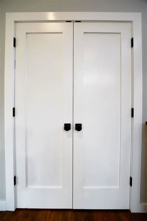 Ranch 31 Single Panel Doors With Modern Black Hardware
