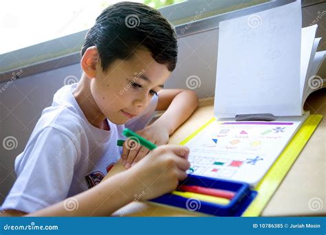 Boy Engross Doing His Math Coloring Homework Stock Image Image Of