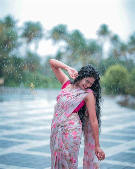 Malayalam Actress Monisha Arshak Saree Stills In Rain