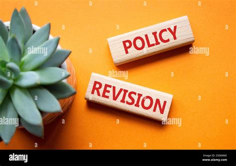 Policy Revision Symbol Concept Word Policy Revision On Wooden Blocks