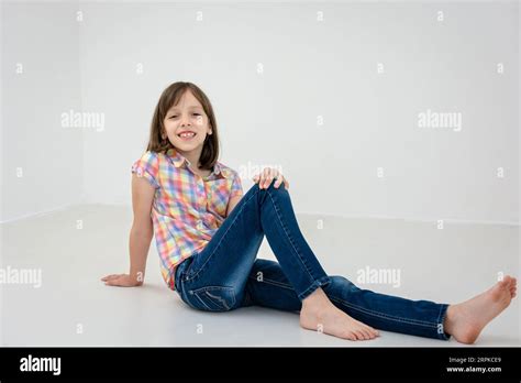 Girls Barefoot In Blue Jeans