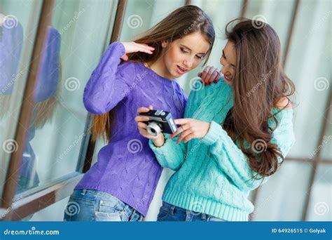 Two Girlfriends With A Retro Camera In The City Stock Image Image Of Lady Girls 64926515