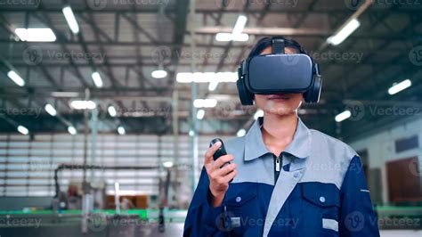 Engineer Is Using Virtual Reality Glasses To Inspect The Factorys