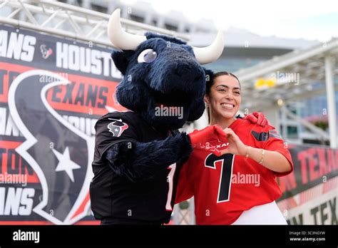 Julianna Ventura Right Poses With Houston Texans Mascot Toro During