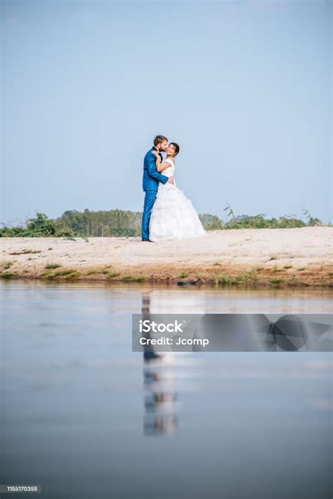 Asian Bride And Caucasian Groom Have Romance Time And Happy Together