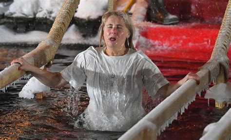Russia Celebrates Orthodox Epiphany With Tradition Of Icy Plunges