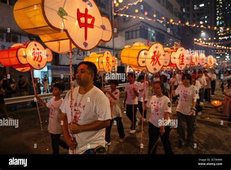Participants Hold Lanterns During The Tai Hang Fire Dragon Dance