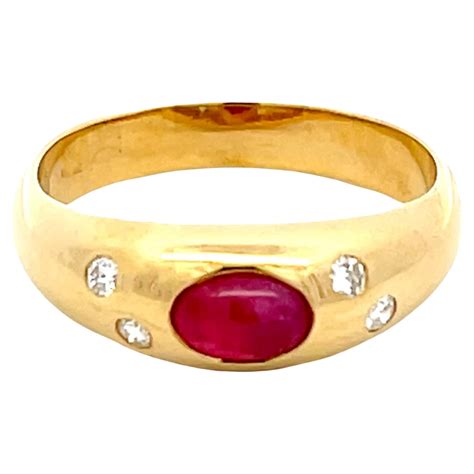 Vintage Red Oval Ruby And Four Diamond Ring In 18k Yellow Gold For Sale
