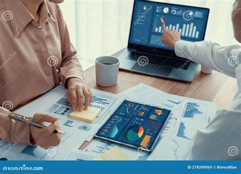 Analyst Team Colleague Discuss Financial Data On Digital Dashboard