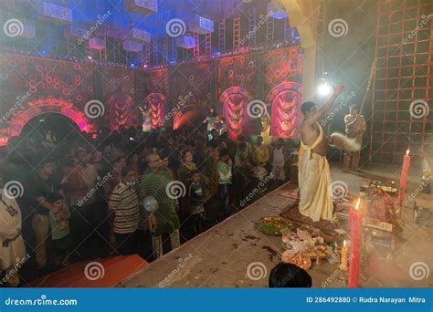 Hindu Bengali Sari Clad Women Praying To Goddess Durga Inside Durga
