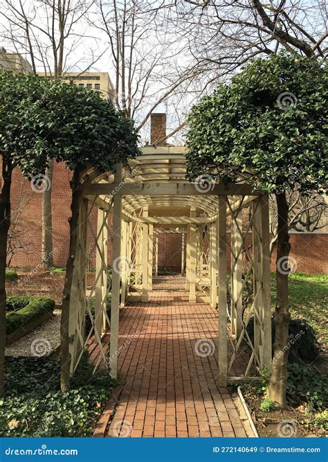 Wood Archway And Brick Path In A Garden Editorial Stock Image Image