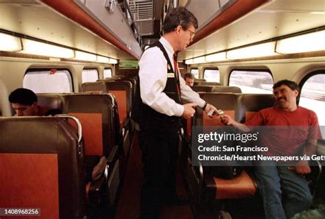 Train Conductor And Ticket Photos And Premium High Res Pictures Getty