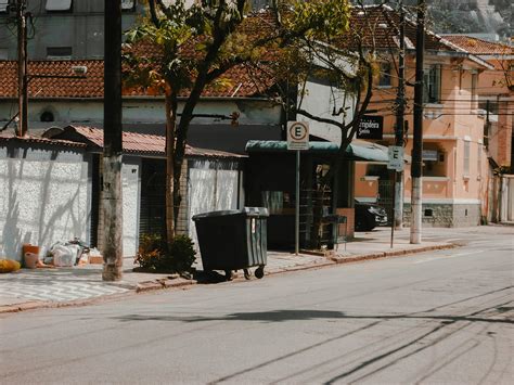 View Of A House Behind A Fence Photographed From A Street · Free Stock
