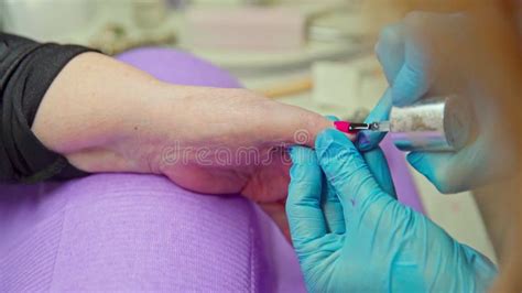 The Stylist Applies Topcoat To The Client S Thumb Nail Stock Footage
