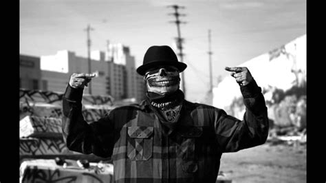 Download A Black Gangster Walking With His Crew In Their Neighbourhood