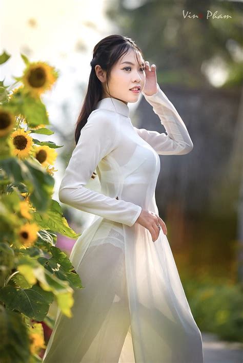 White Ao Dai On A Sunny Day Near The Sunflowers R Aodai