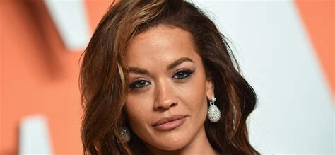 Rita Ora Stuns In Tiny Orange Bikini During Sun Soaked Getaway