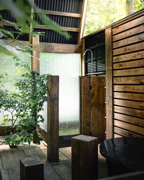 Elevated Shipping Container Cabin In Ohio Forest With Outdoor Shower