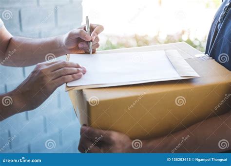 Delivery Mail Man Giving Parcel Box To Recipient And Signature Form