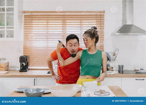 Wife Cooking For Husband And He Tastes The Delicious Food With Smile