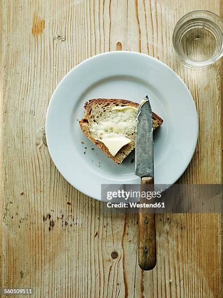 Buttering Photos And Premium High Res Pictures Getty Images